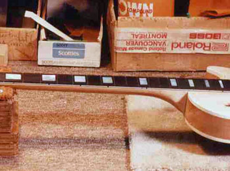 Refinishing and refretting with Gibson style binding